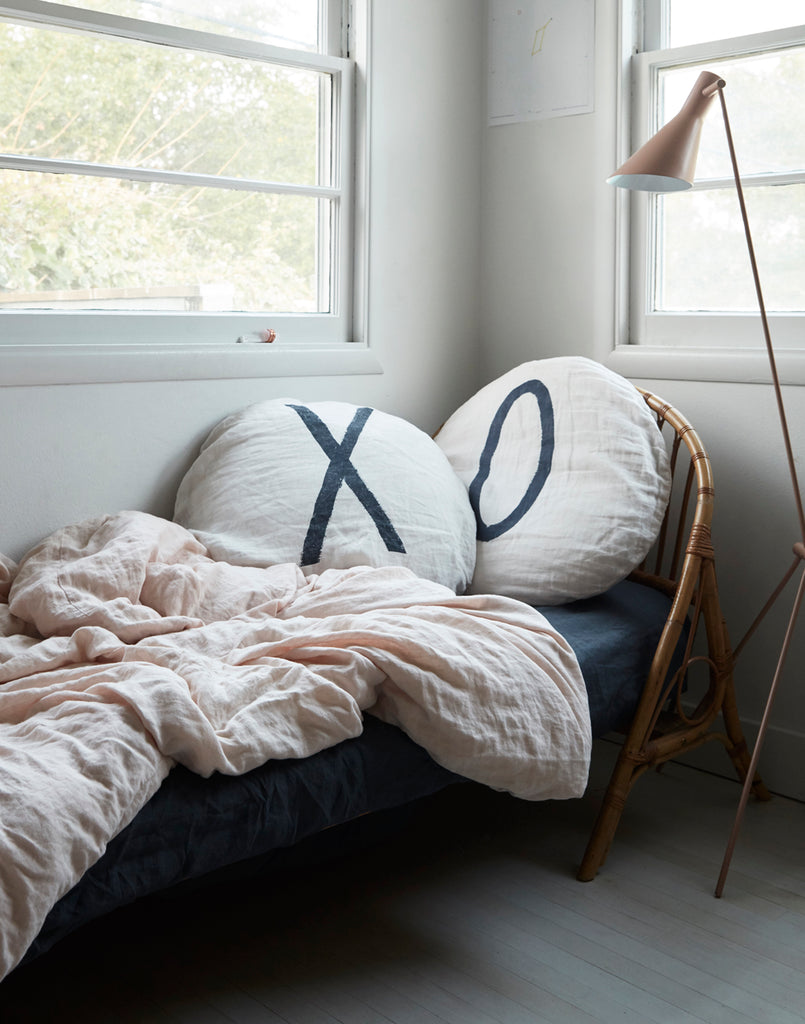 Round Chalk Pillow with "X"– Two Dawson